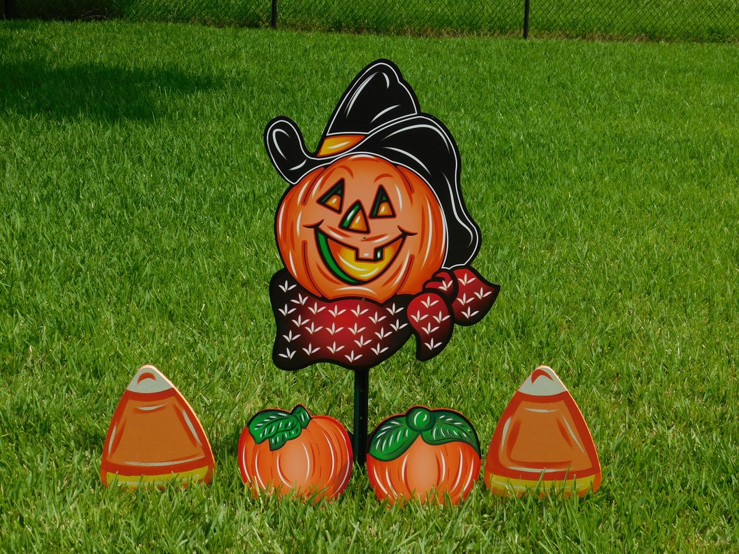 Pumpkin Wearing Cowboy Hat With 2 Small Pumpkins and 2 Candy Corns ...