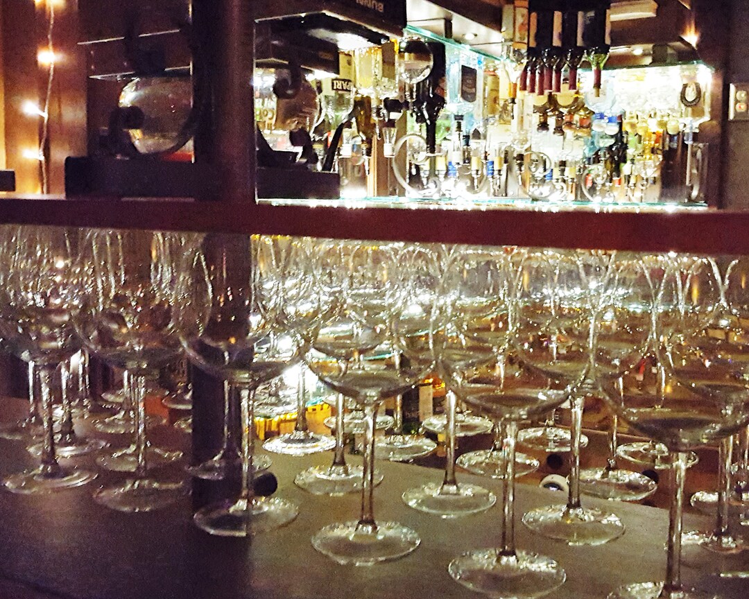 Digital Photo of Long Stem Bar Glasses and Other Glassware in Cabinet ...