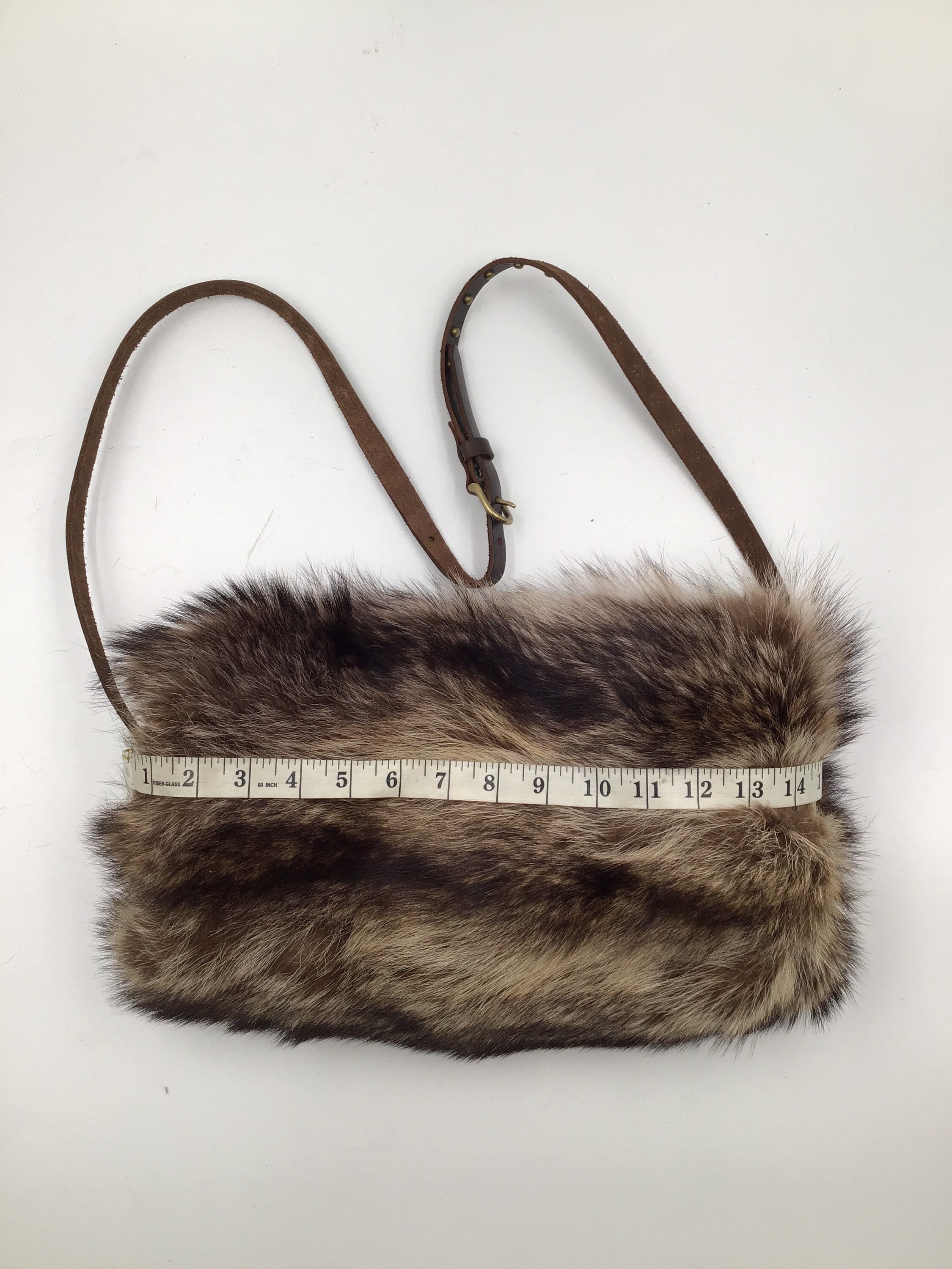 Brown women's muff from raccoon fur festive look fluffy | Etsy