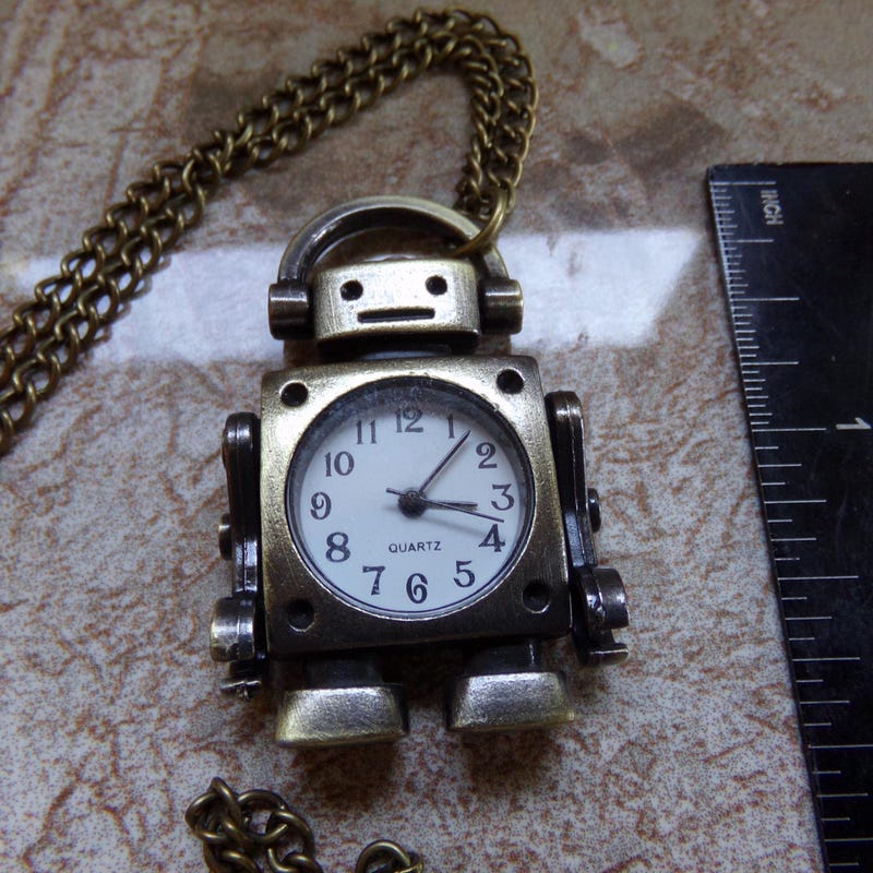 Animal Clock Necklace - Etsy