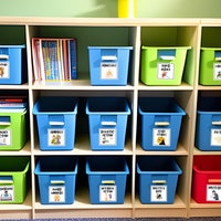 Class Library Genre and Author Bin Labels With Posters in an Ocean ...