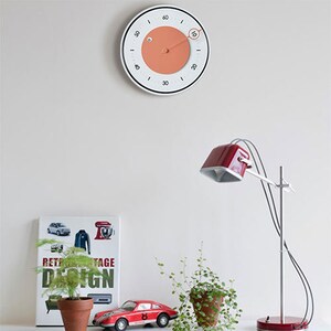 Modern Wall Clock With a Rotating Disc, Glass Cover & Silent, Non ...