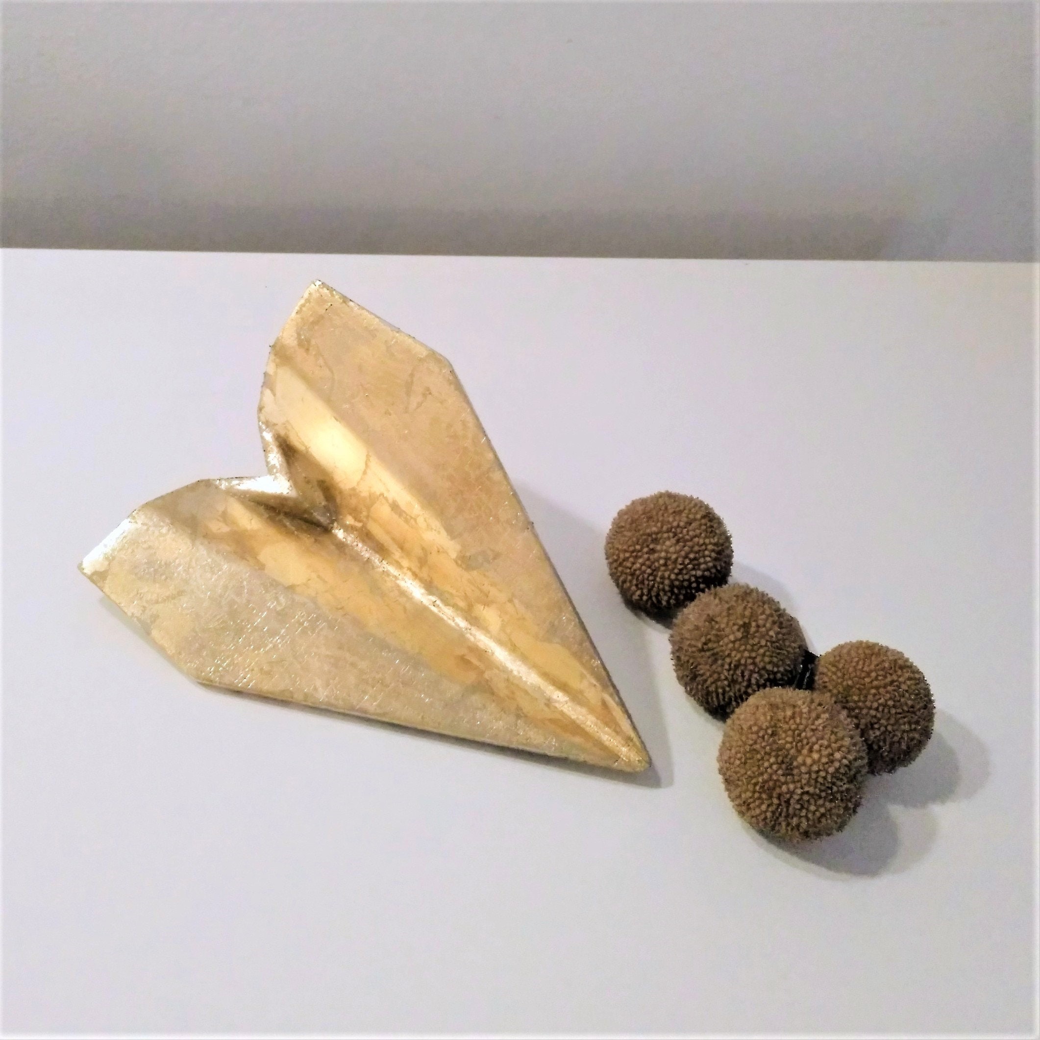 Origami Style Airplane With Golden Metal Finish in Grey Ceramic Resin ...