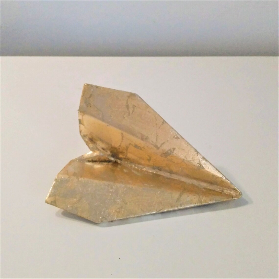 Origami Style Airplane With Golden Metal Finish in Grey Ceramic Resin ...