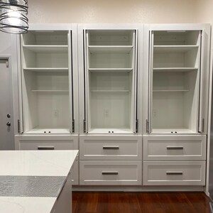 Three Unit Kitchen Cabinet With Shelves and Pocket Sliding Doors and ...