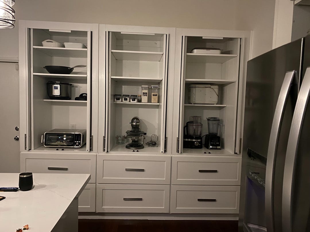 Three Unit Kitchen Cabinet With Shelves and Pocket Sliding Doors and ...