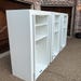 Three Unit Kitchen Cabinet With Shelves and Pocket Sliding Doors and ...