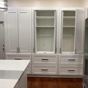 Three Unit Kitchen Cabinet With Shelves and Pocket Sliding Doors and ...