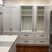 Three Unit Kitchen Cabinet With Shelves and Pocket Sliding Doors and ...