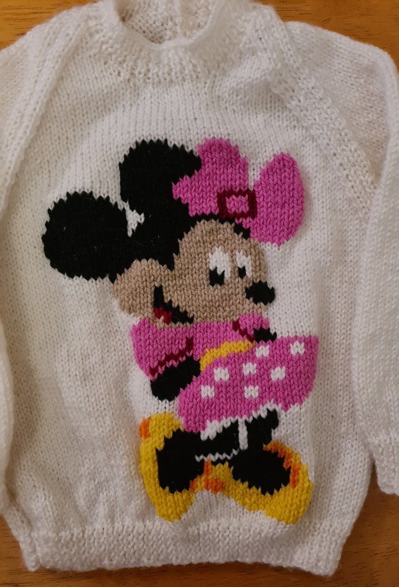 NEW = Hand Knitted Childs Jumper, Featuring Minnie Mouse. Main Colour ...