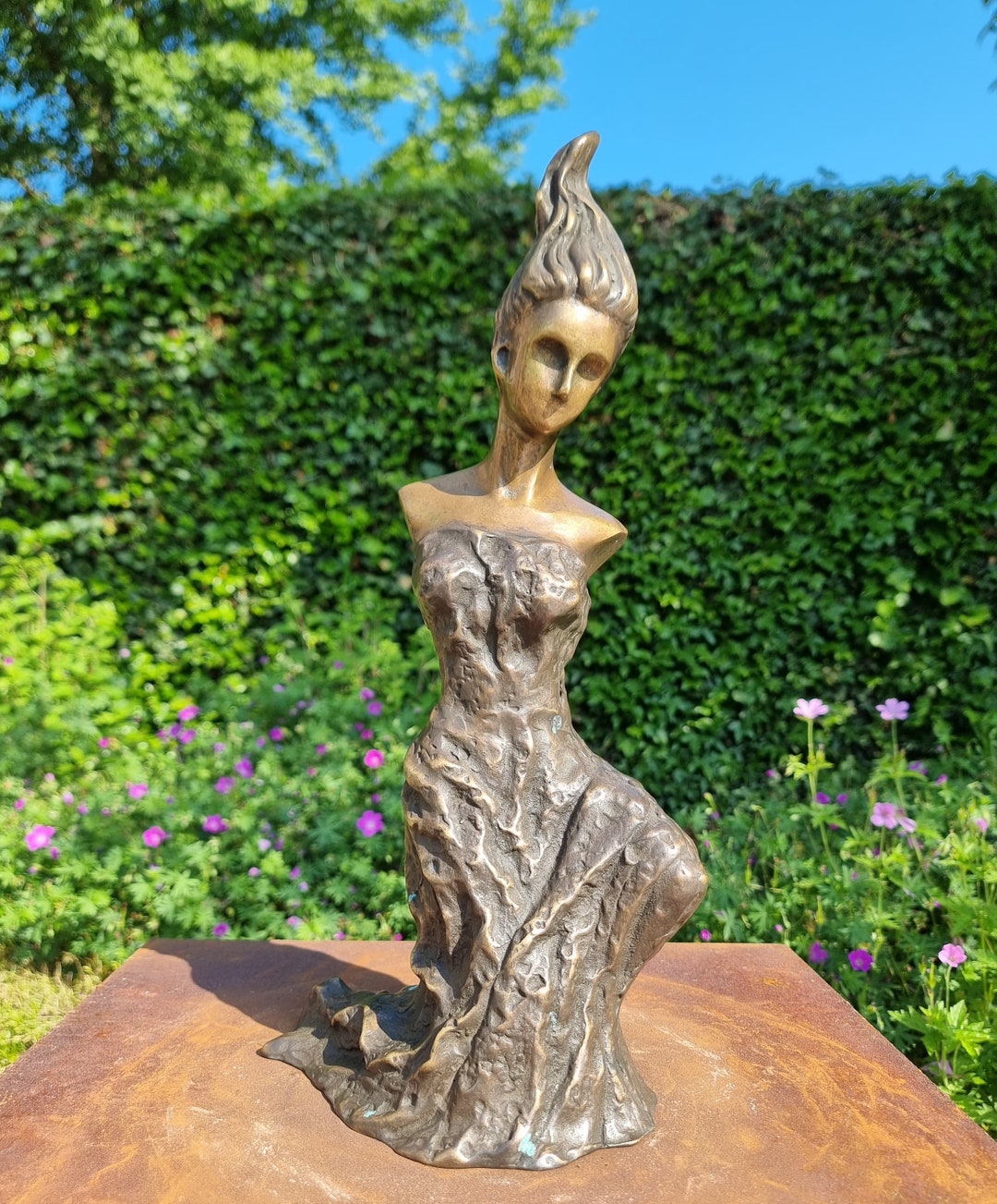 Abstract Bronze Sculpture of a Kneeling Woman Graceful and Simple at ...