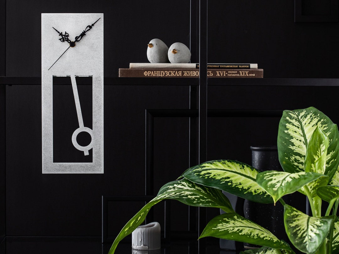 Abstract Modern Metal Shelf Sitter Clock With Pendulum Silver Designer ...