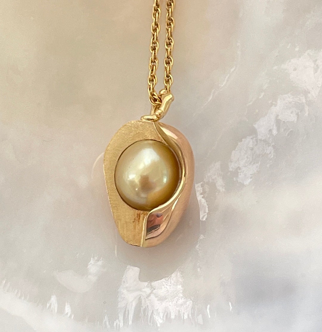 Rare Mango Pendant With 9mm Natural Color Golden South Sea Cultured ...