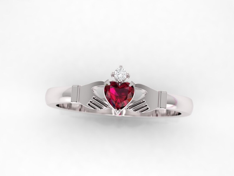 Claddagh Ring. Ruby and Diamond Claddagh Ring. Available in 9K, 14K ...