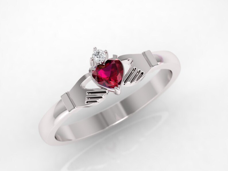 Claddagh Ring. Ruby and Diamond Claddagh Ring. Available in 9K, 14K ...