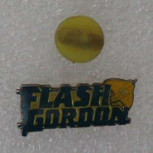 1980s FLASH GORDON Logo Lapel Pin 1" X 0.5" (2.5 X 1.25 Cm.) Original ...