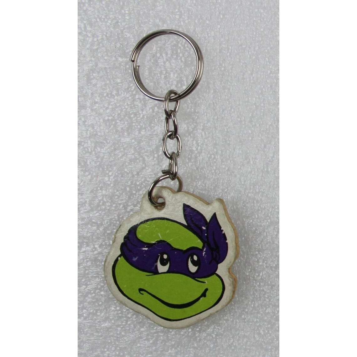1991 TMNT DONATELLO Keychain 2" X 1.75" (5 X 4.5 Cm.) Spanish ...