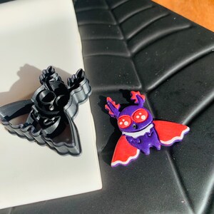 Moth Man Cryptid With Fluffy Antennae Mothman Embossed Sharp Clay ...