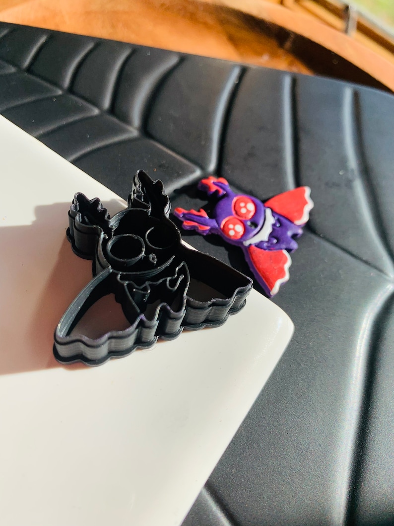 Moth Man Cryptid With Fluffy Antennae Mothman Embossed Sharp Clay ...