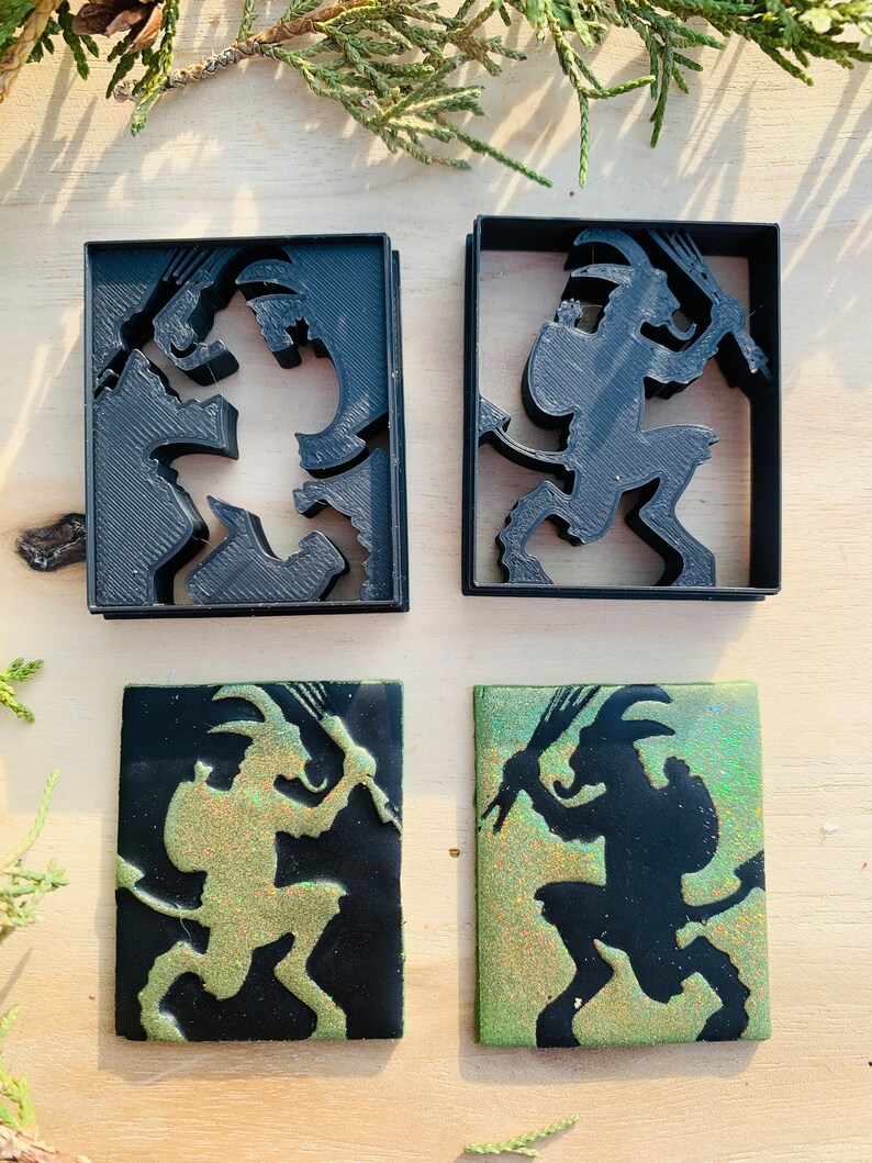 Inverted Mirrored Pair of Krampus Silhouettes Embossed Sharp Clay ...