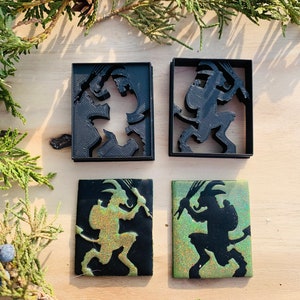 Inverted Mirrored Pair of Krampus Silhouettes Embossed Sharp Clay ...