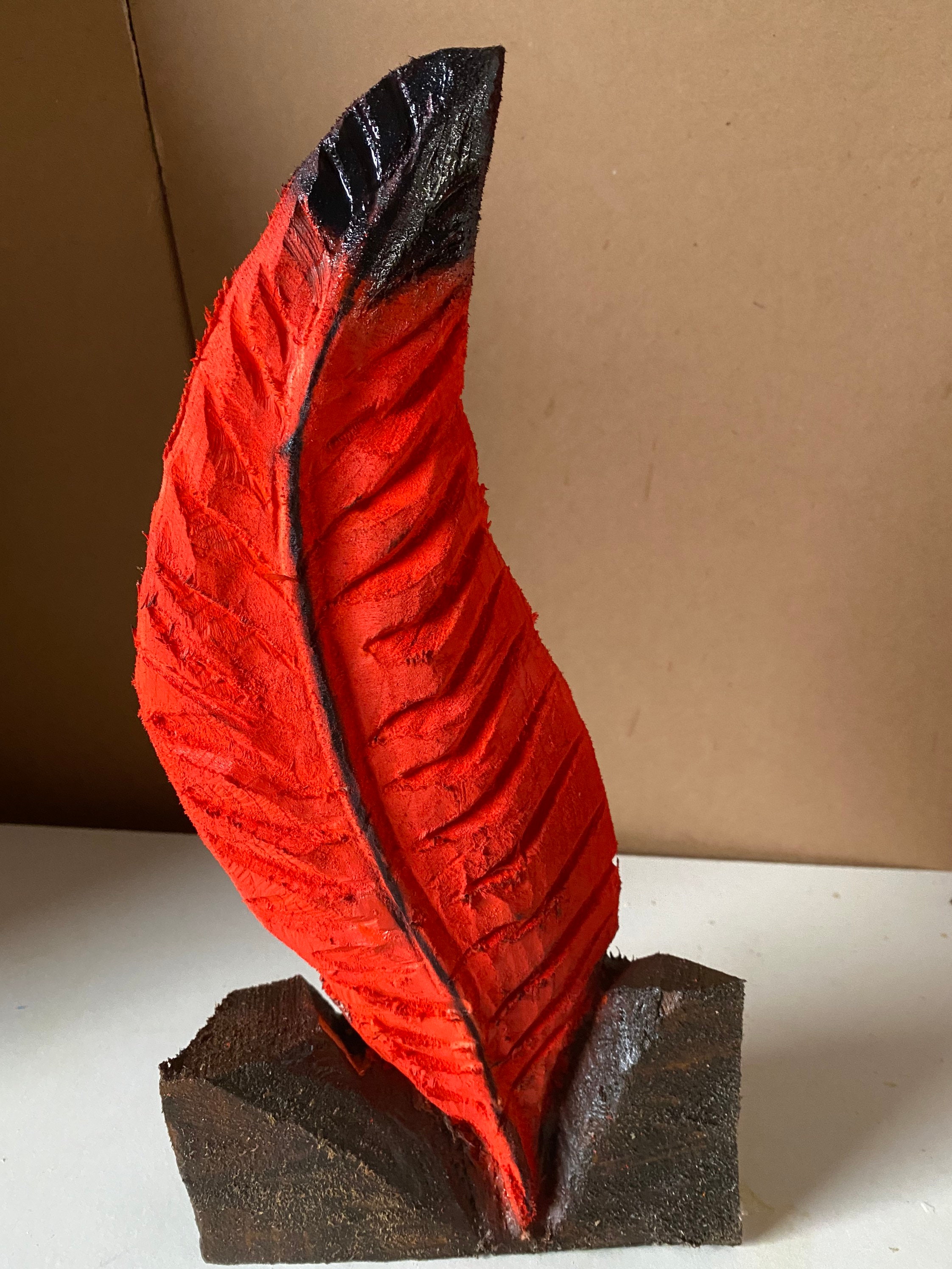 Chainsaw carved feather red wood carvings | Etsy