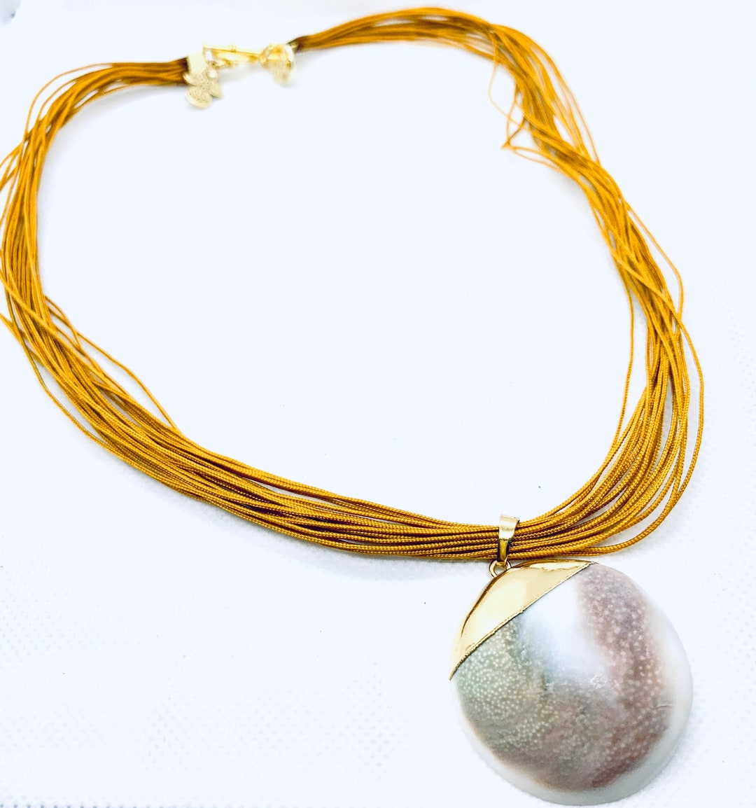 Natural White Shell Eye of Saint Lucia Wild Coast Necklace - Etsy UK