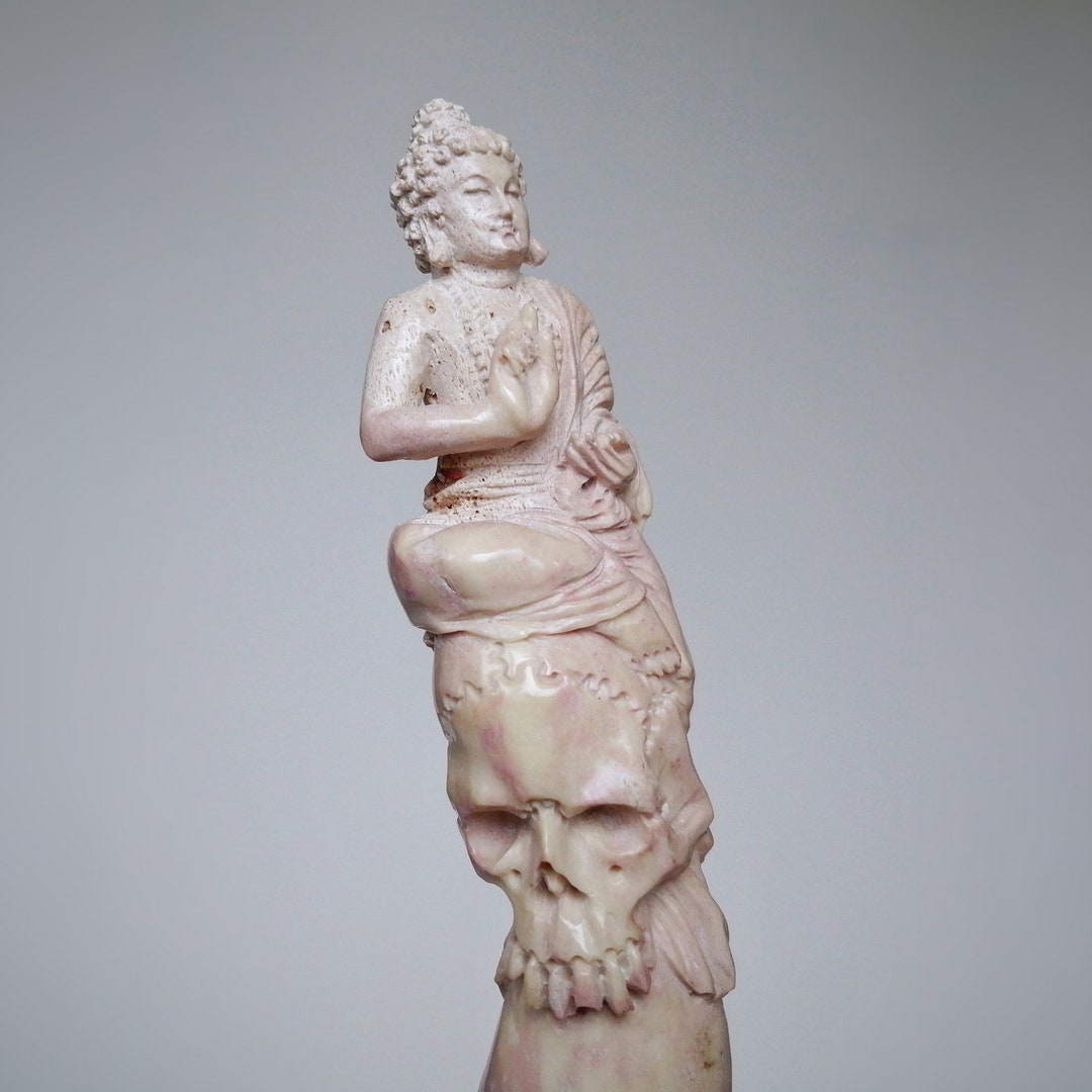 Buddha Statue Carved From a Deer Horn sitting on a Skull - Etsy