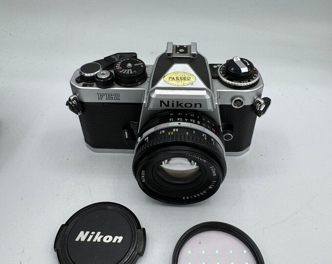 Beautiful Nikon FE2 35mm Film Camera W/nikkor 50mm 1.8 Lens ...