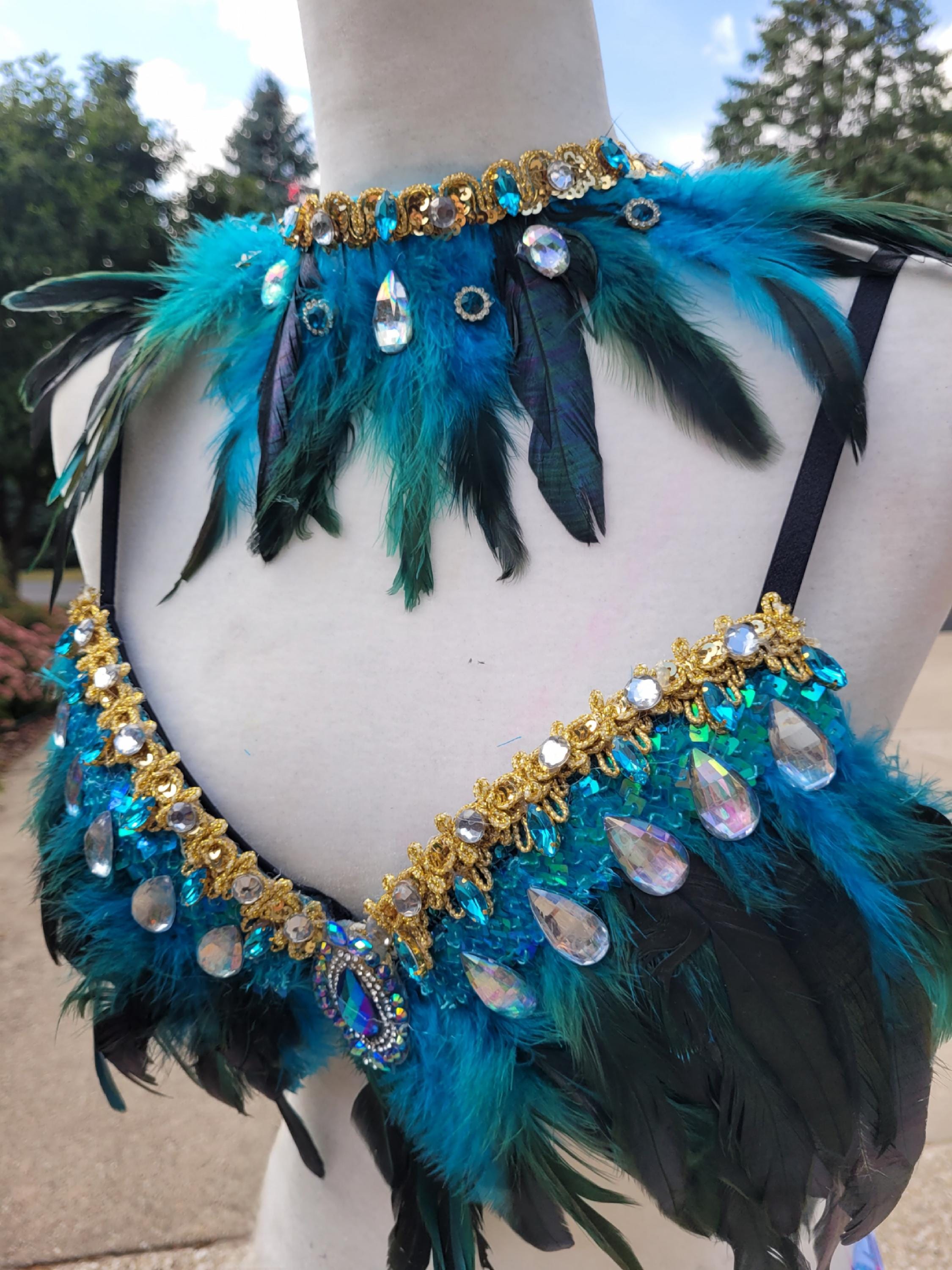 A Turquoise and Gold Feathered Rave Bra and Choker, Rhinestone ...