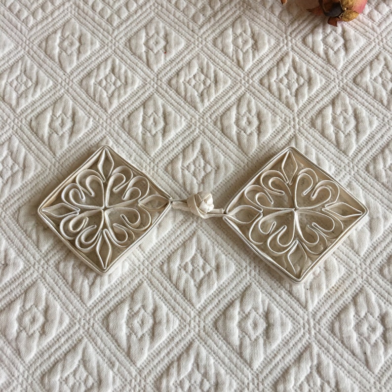 Vintage Frog Closures. White Woven Trim Folded Design Fleur De Lis ...