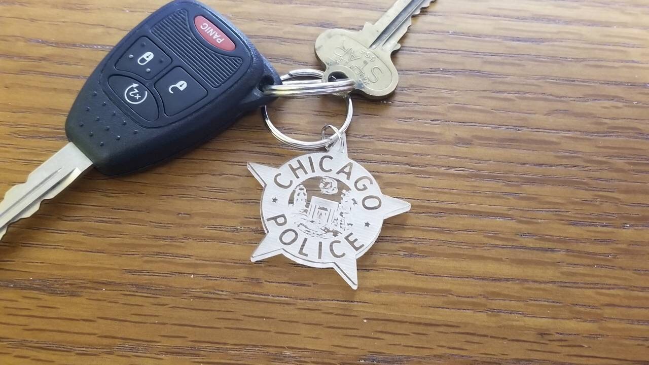 Your choice of Police Department key chains. | Etsy