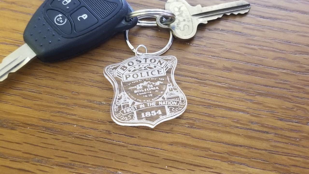 Your choice of Police Department key chains. | Etsy