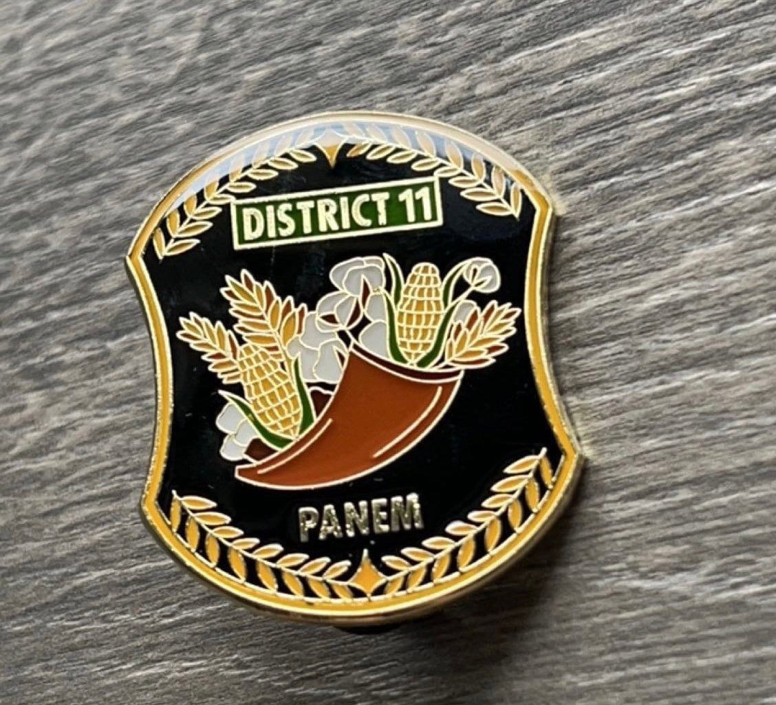 Hunger Games District 11 Symbol