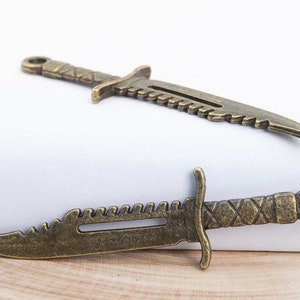 5 Dagger Charm Double Sided Antique Bronze Tone 110198-1569 - Etsy