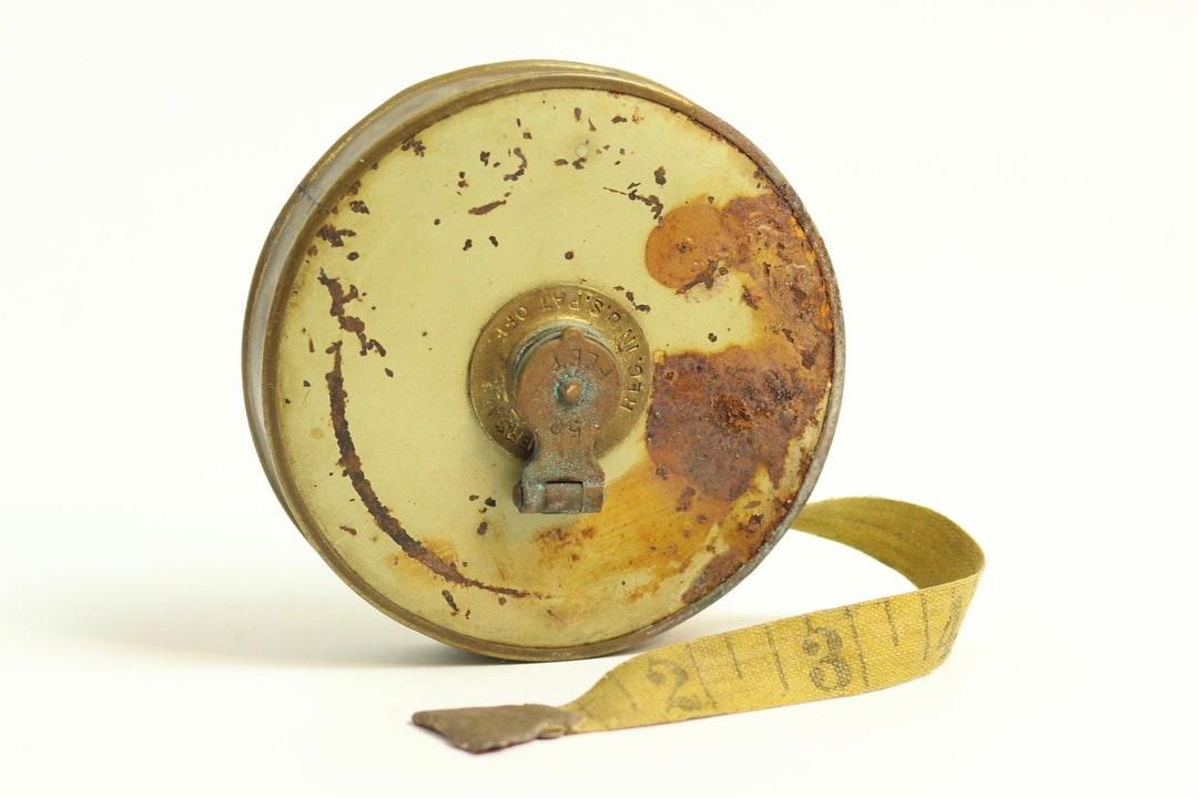 Vintage Rusty Metal Tape Measure. 50 Feet. Retractable. Winding. Aged ...