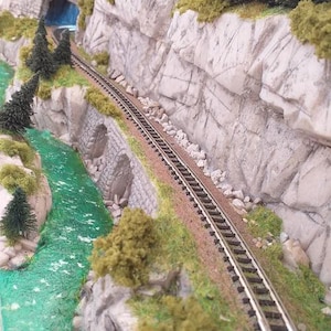 Model Railway With a Realistic Forest Mountain Layout, With Lakes and ...