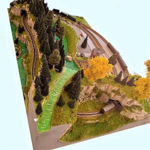 Model Railway With a Realistic Forest Mountain Layout, With Lakes and ...