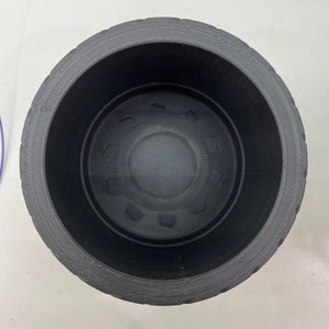 Original Tire Pot // A Stack of Tires Flower Planter That Looks Like a ...