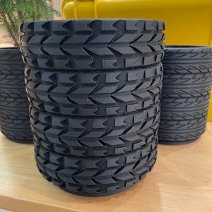 Offroad Tire Pot // A Stack of Tires Flower Planter That Looks Like a ...