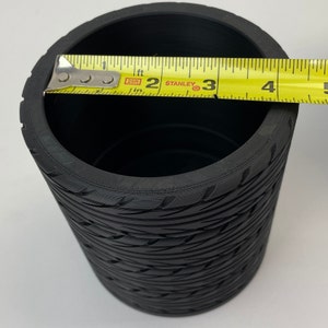Original Tire Pot // A Stack of Tires Flower Planter That Looks Like a ...