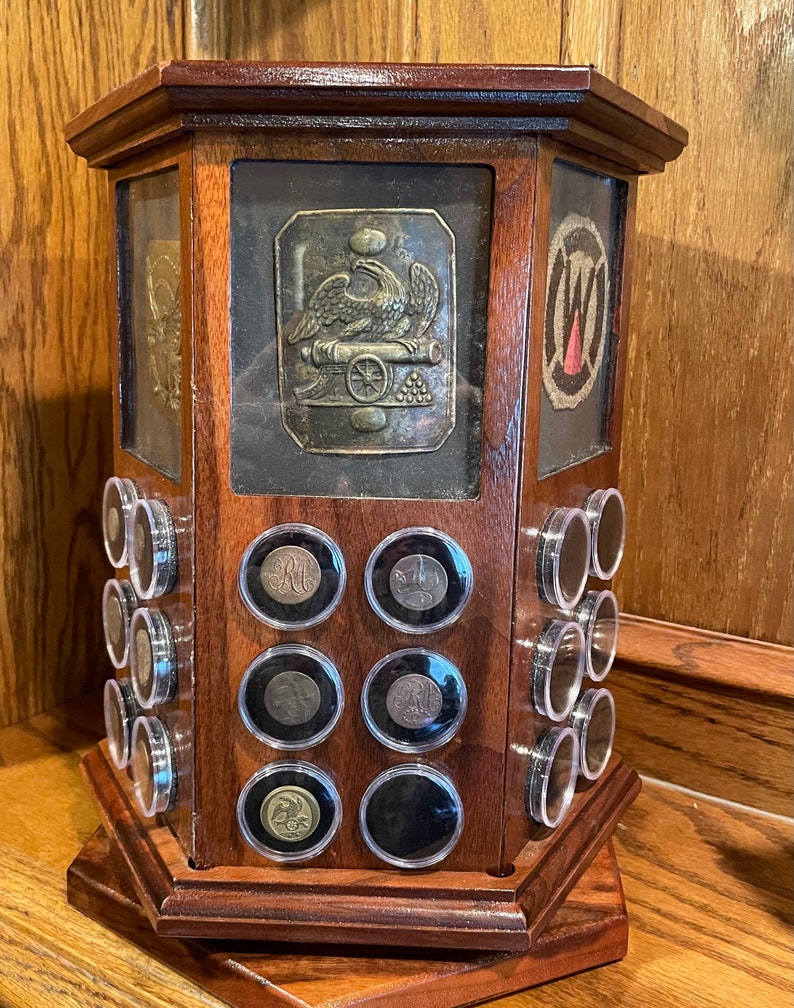 Elegant Innovative Rotating Display Case for Collectibles Like Insignia ...