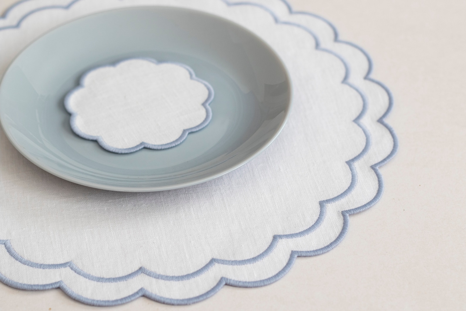 White linen round table mats with scallop edges in light blue | Etsy