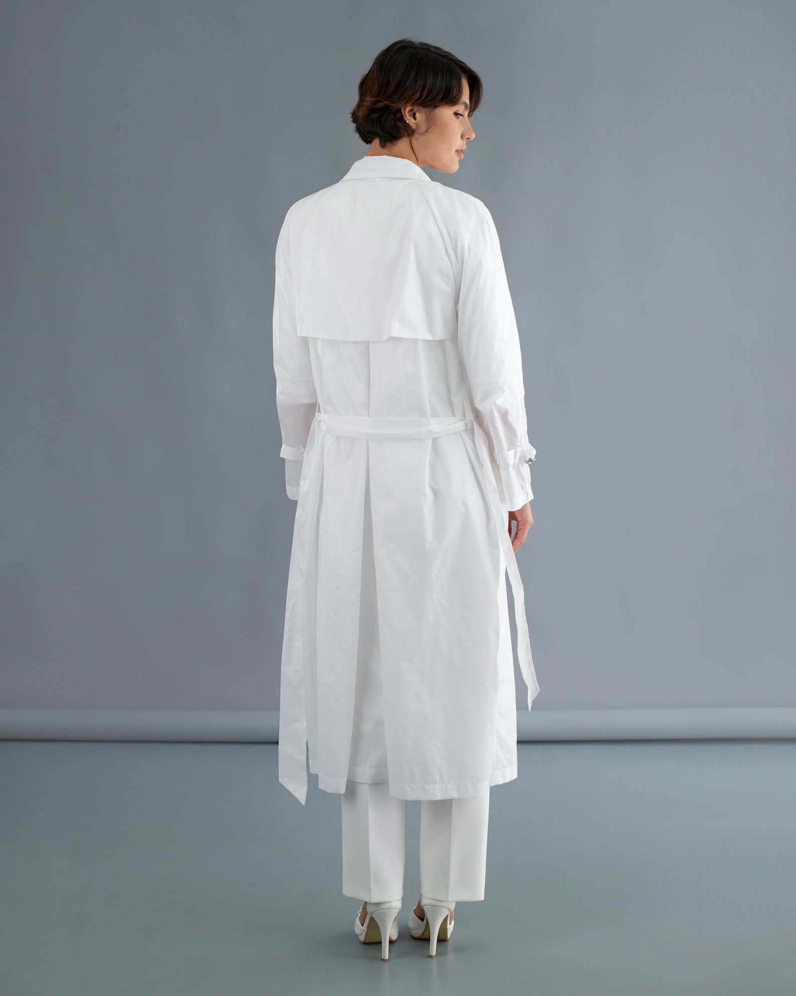 white raincoat