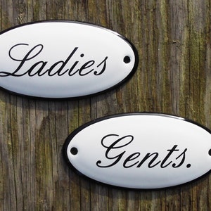 Classic Enamel Ladies & Gents. Signs. Black Text on a White Background ...