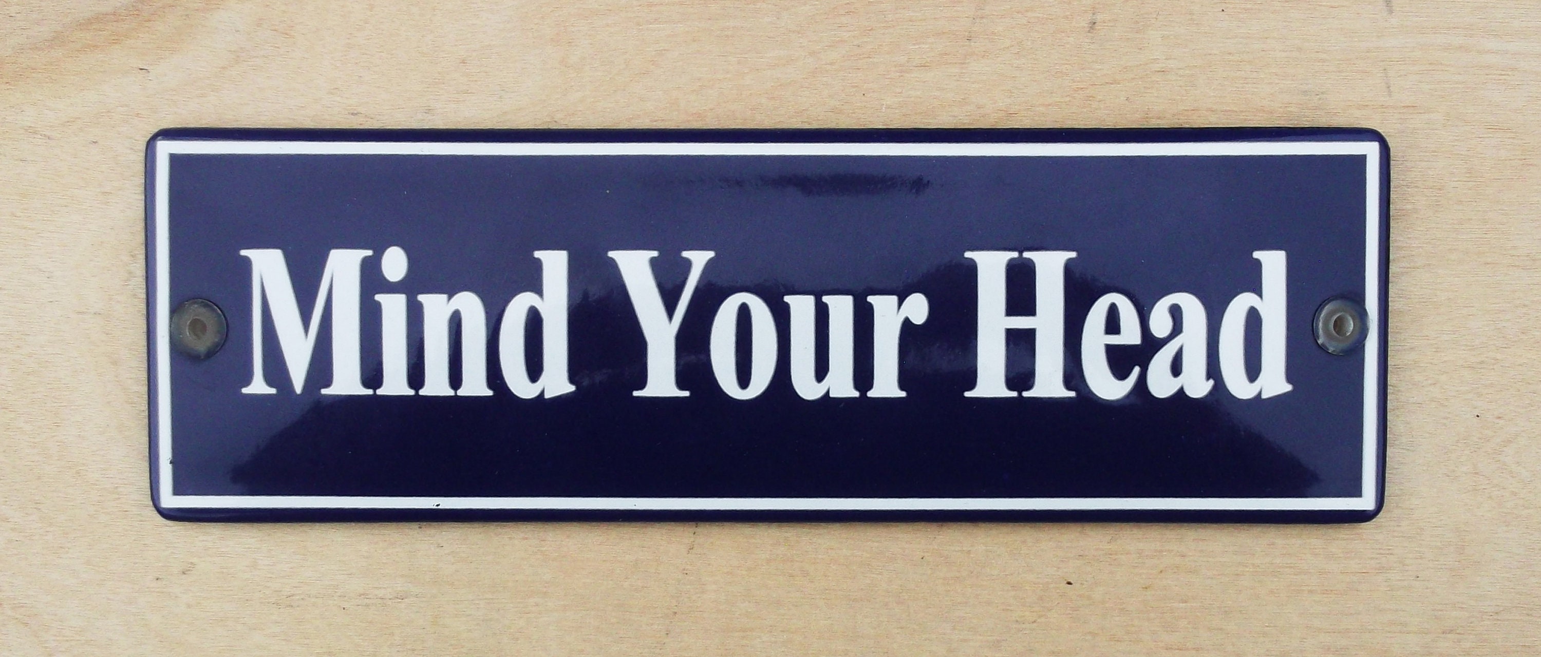 Classic Enamel 'mind Your Head' Sign. White Text on a Blue Background ...