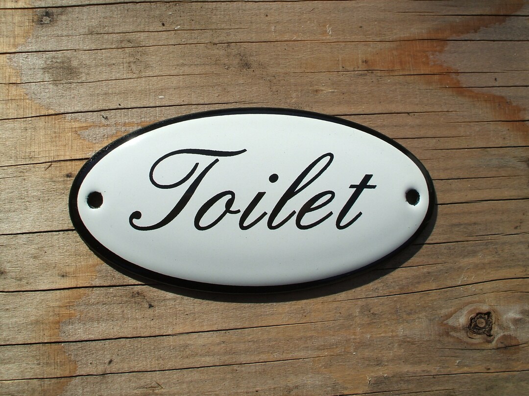 Classic Enamel Toilet Sign. Black Text on a White Background, Oval ...