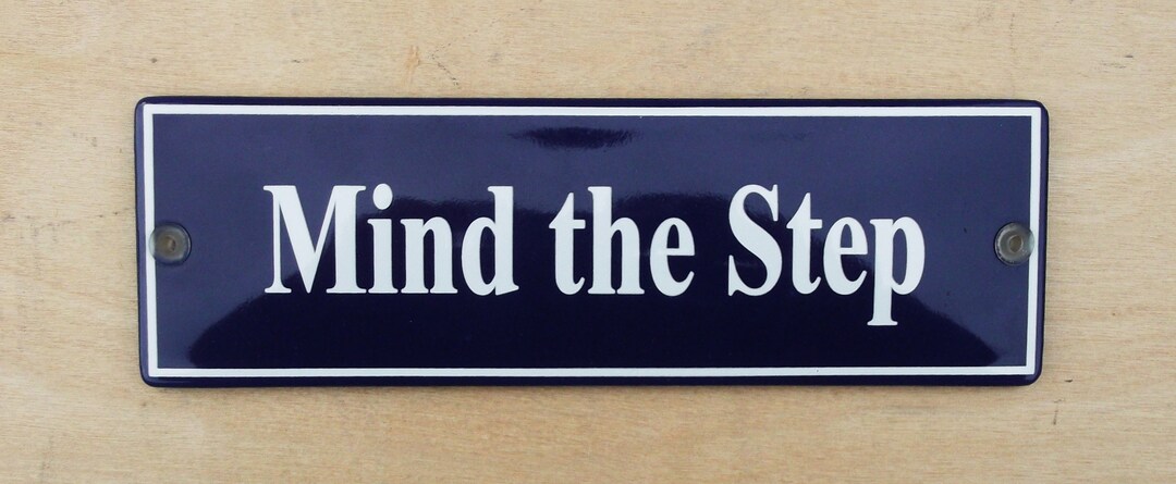 Classic Enamel 'mind the Step' Sign. White Text on a Blue Background ...