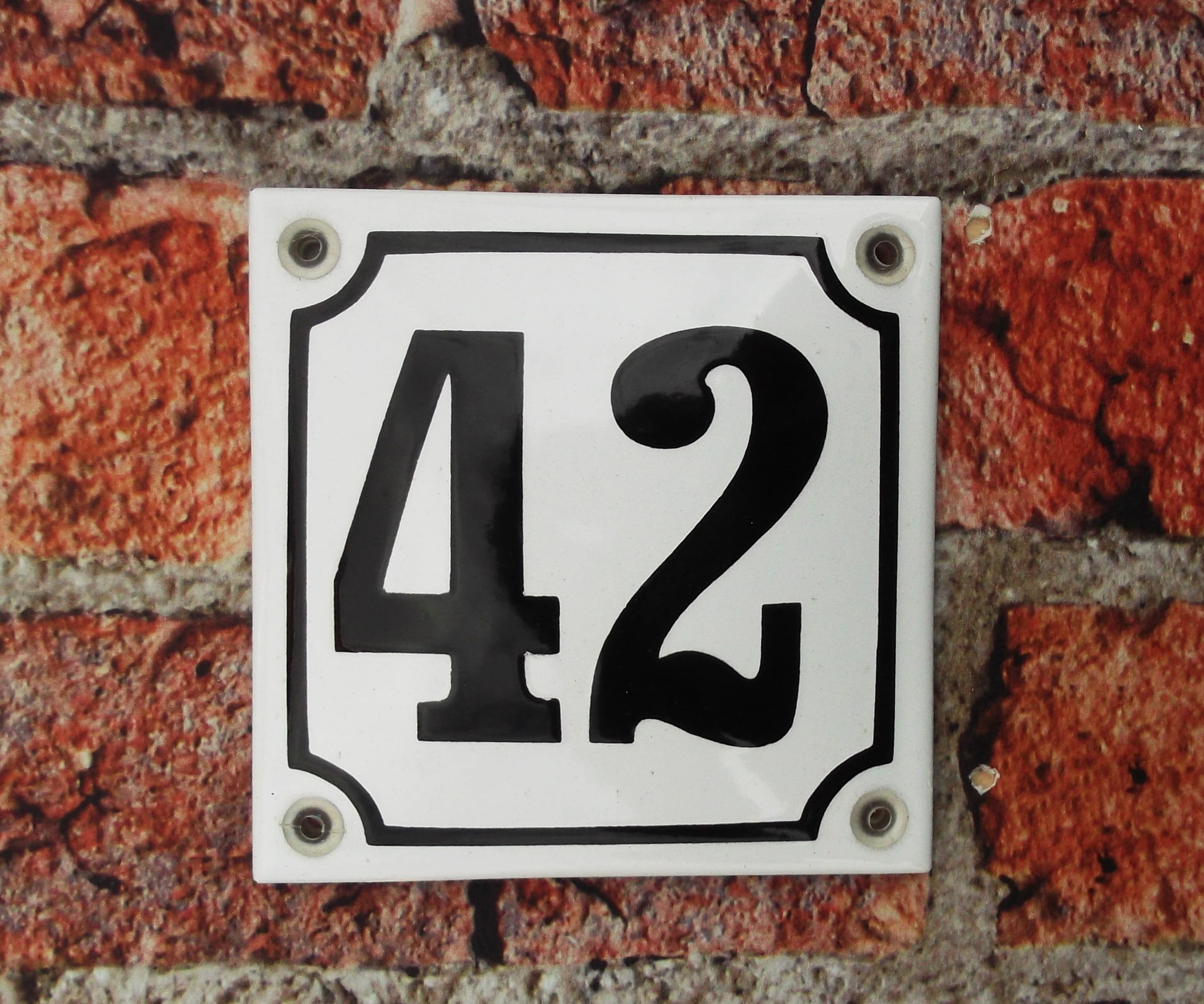 Classic Enamel House Number Sign. Black No.42 on a White Background ...