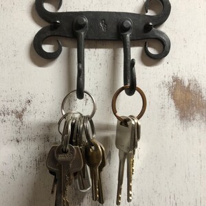 Set of Two Hand Forged Hook Racks With Rams Head Scrolls Traditional ...